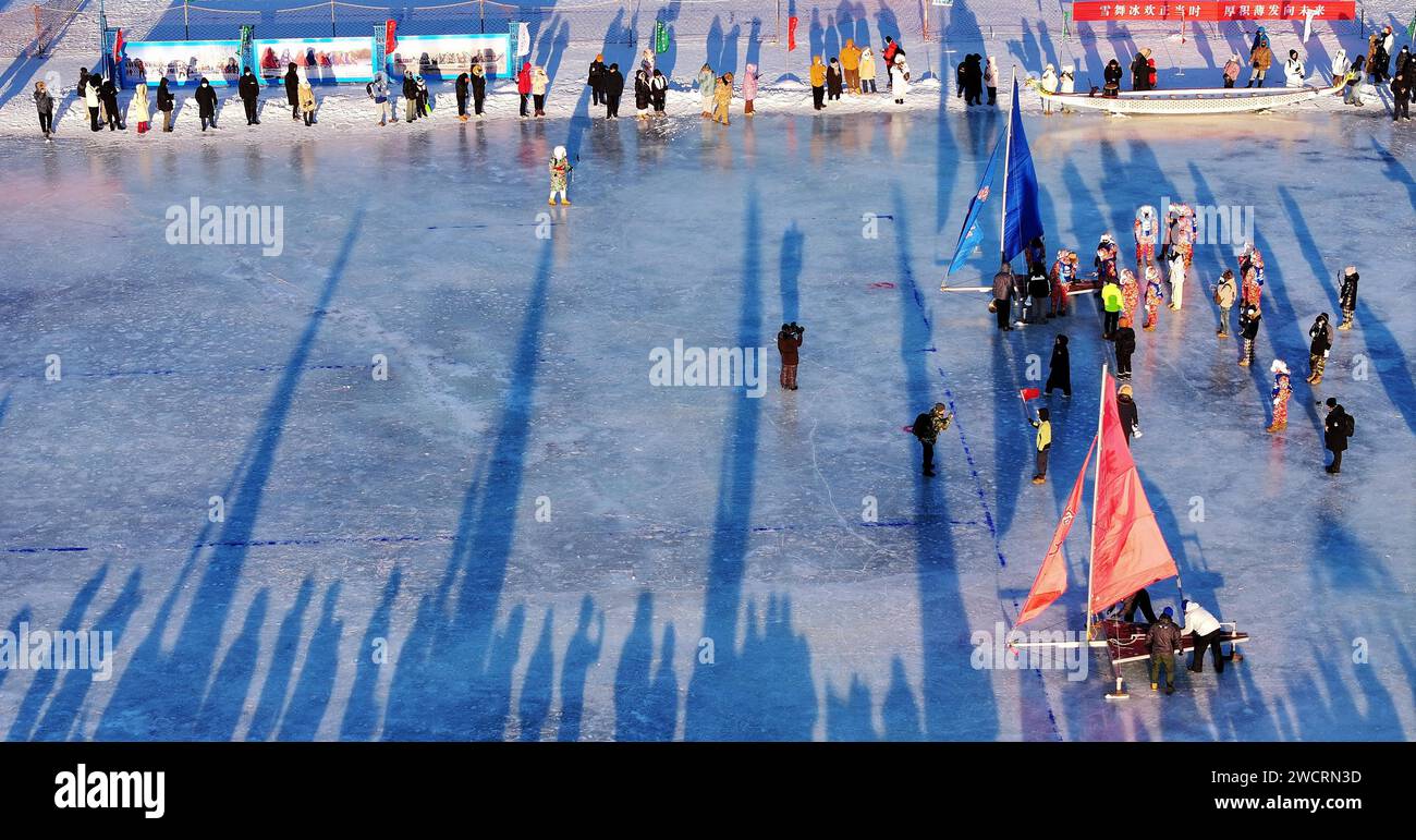 An ice dragon boat race on Songhua River draws tourists in Harbin City ...