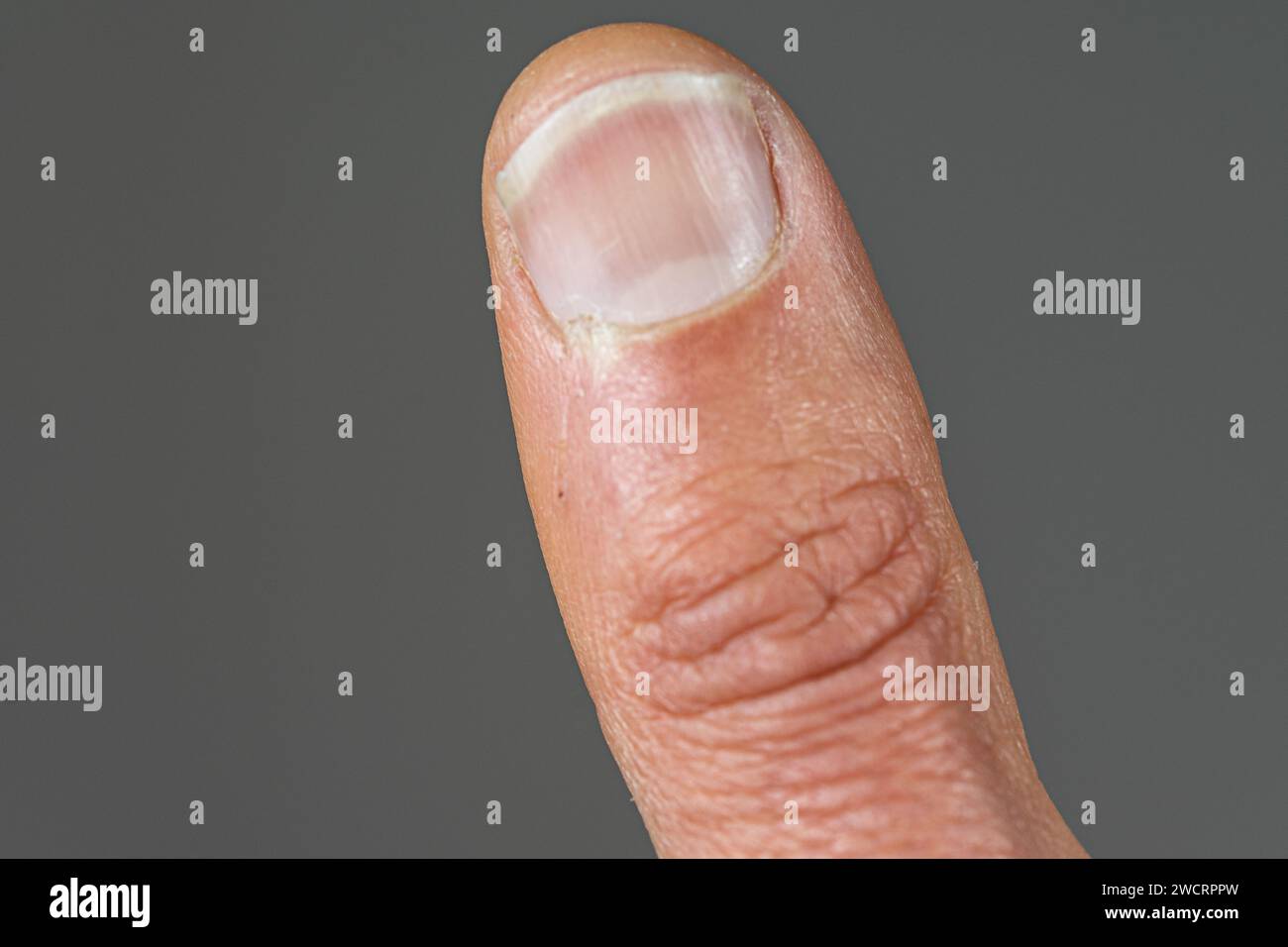 human hand index finger under smooth grey stone background Stock Photo ...