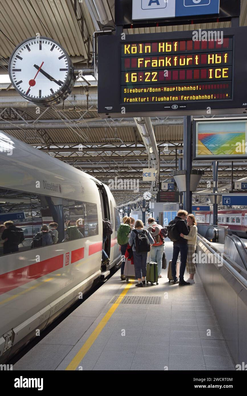 Passengers getting on a Deutsche Bahn ICE inter city high speed train ...