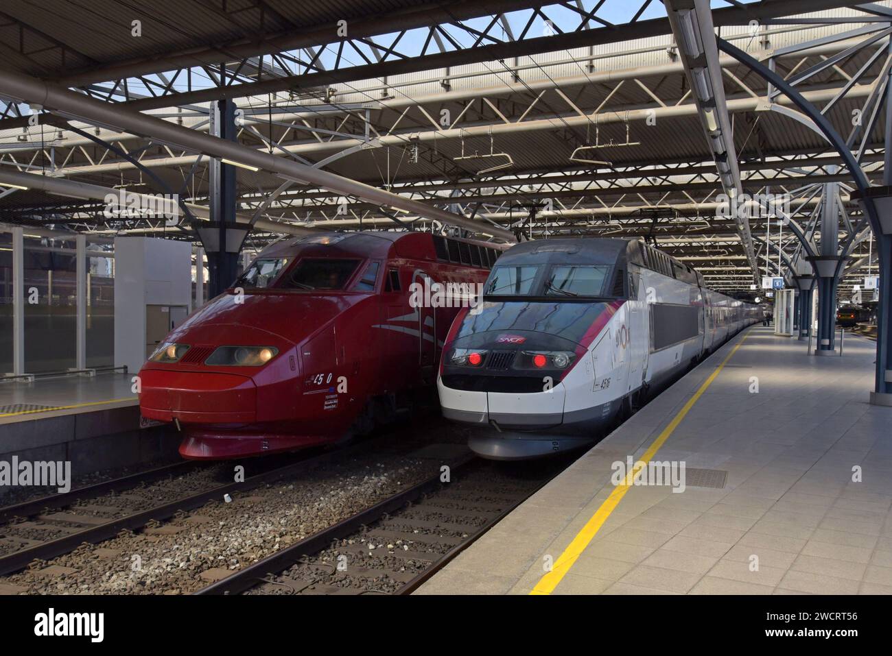 Thalys high speed electric train alongside a French SNCF TGV high speed ...