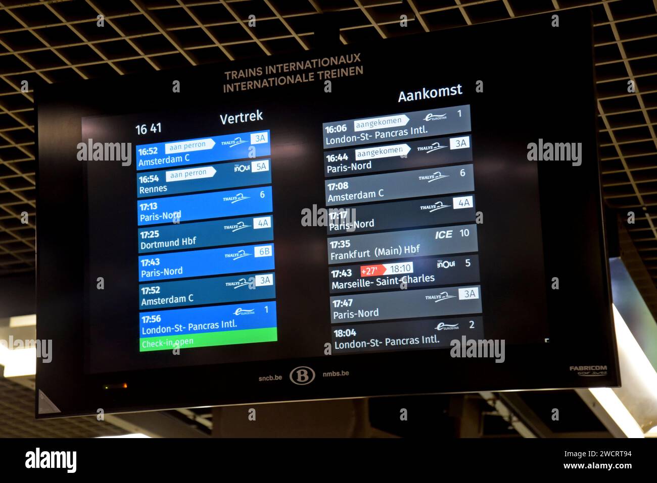 Departues display board at Brussels Midi station, Belgium, showing ...