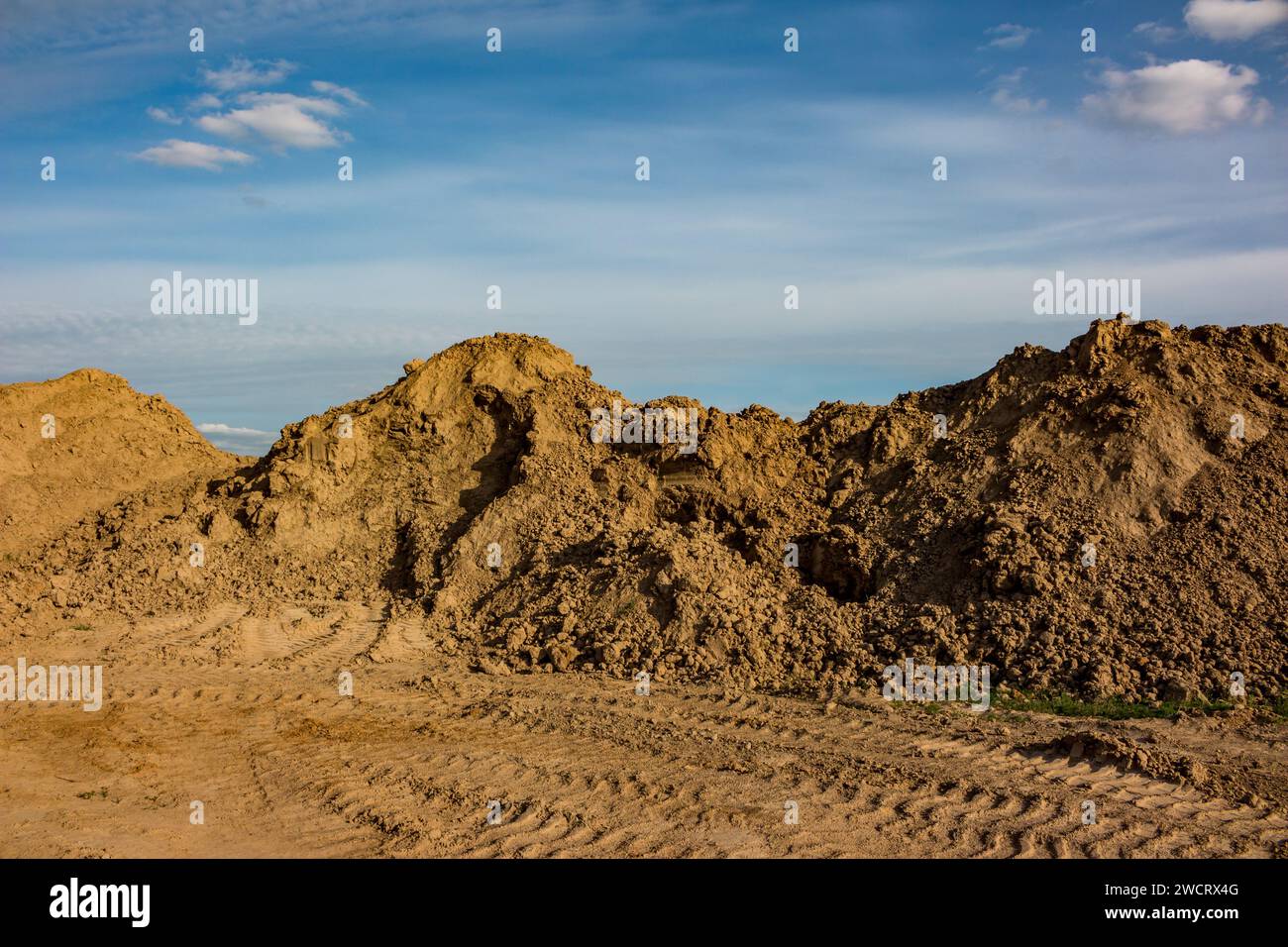 A mound of soil from overburden rocks in the quarry area Stock Photo ...
