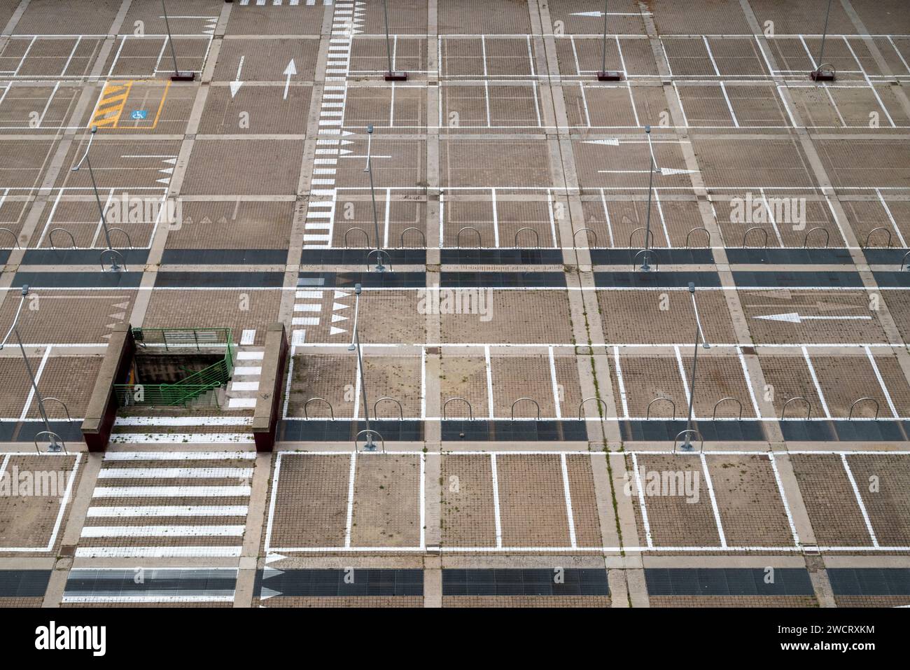 Car parking in the city, shot from above. Geometry lines of white ...