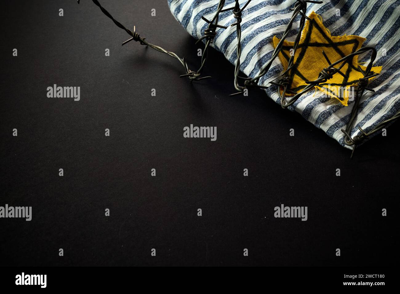 Jewish prisoner with yellow badge on dark background. International ...