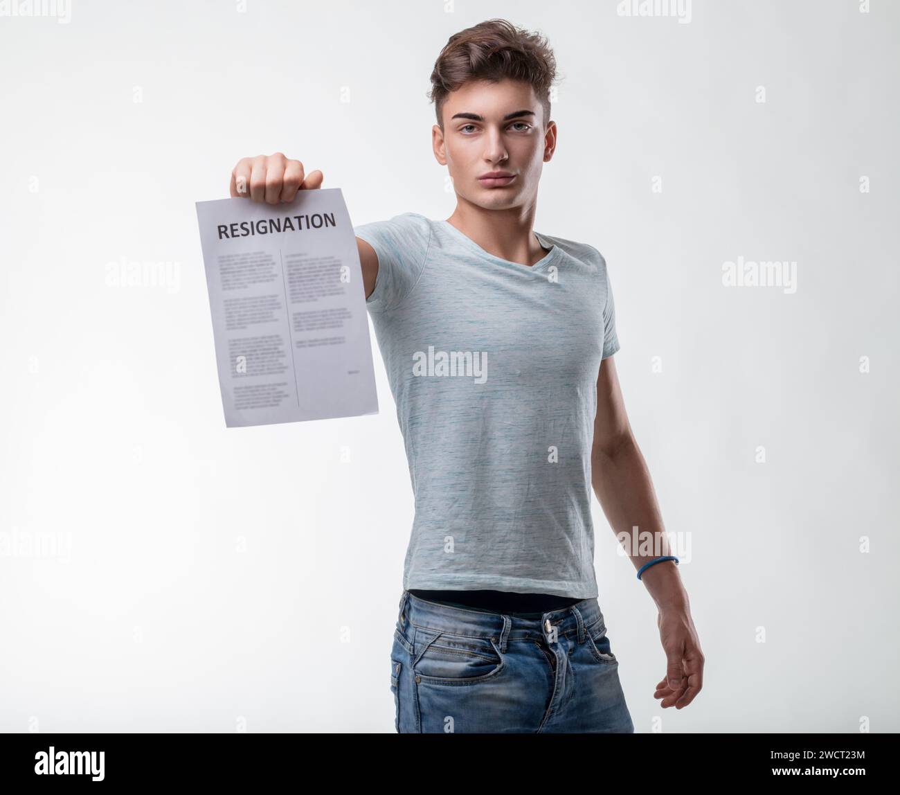 Determined young man presents resignation letter, marking a pivotal ...