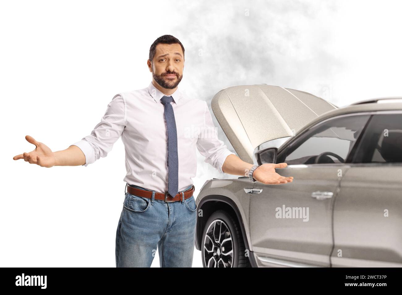 Angry driver standing in front of a SUV with an open hood isolated on ...