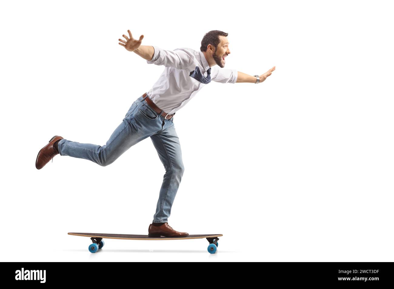 Joyful professional man riding on a skateboard isolated on white ...