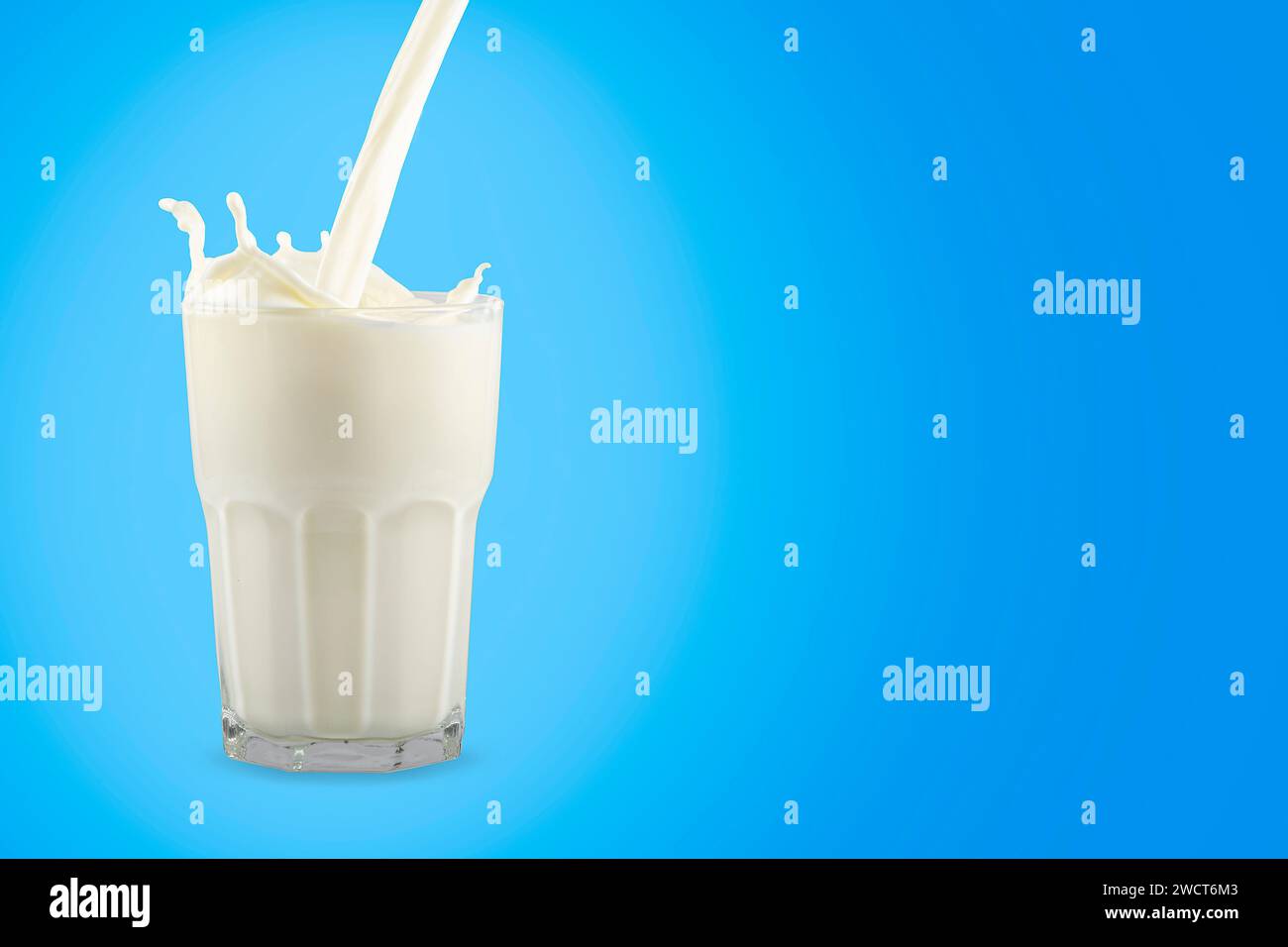 Filling glass of milk. Fresh milk Stock Photo - Alamy