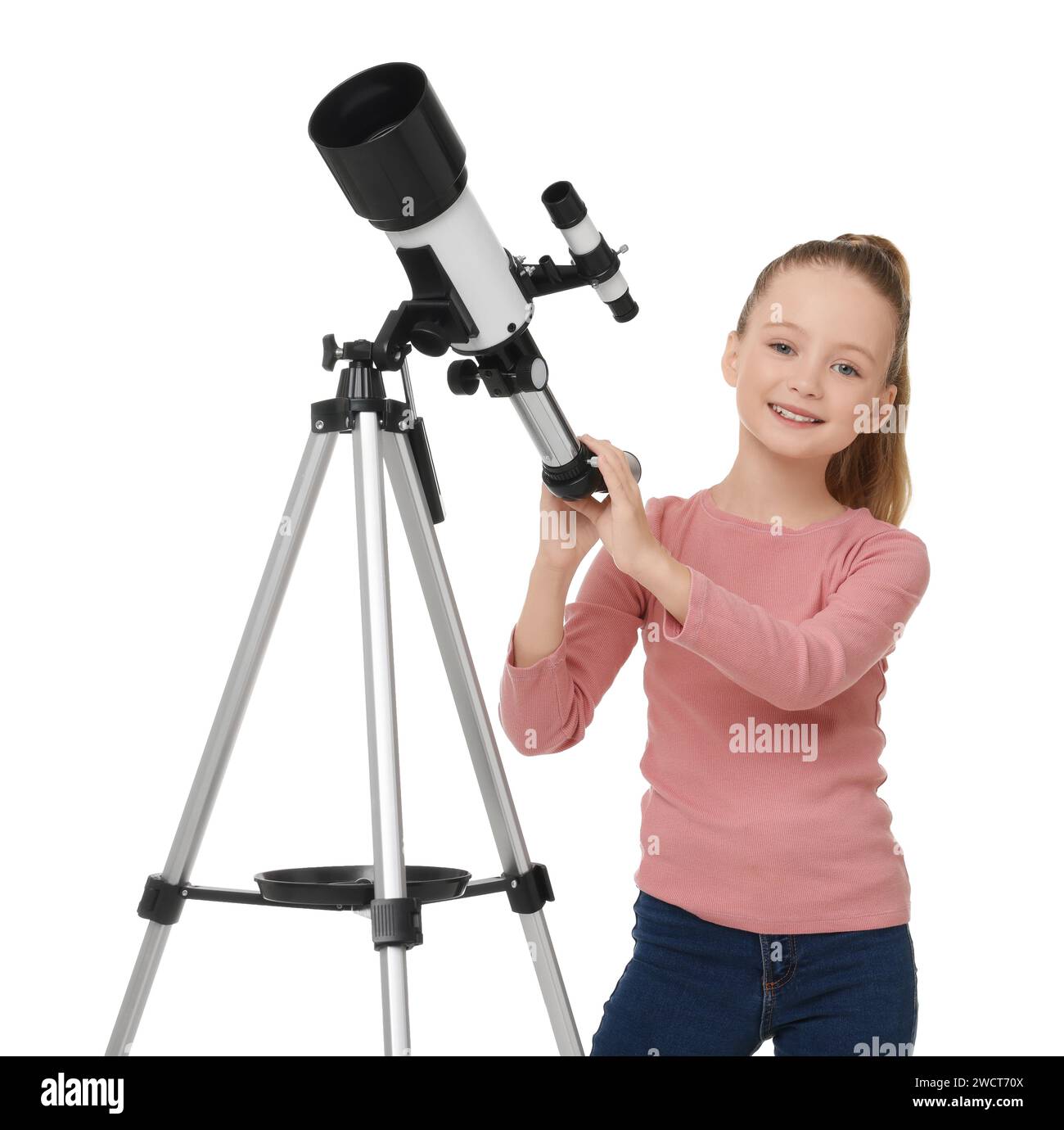 Happy little girl with telescope on white background Stock Photo - Alamy