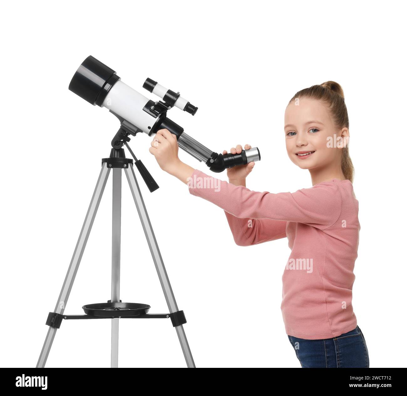 Happy little girl with telescope on white background Stock Photo - Alamy