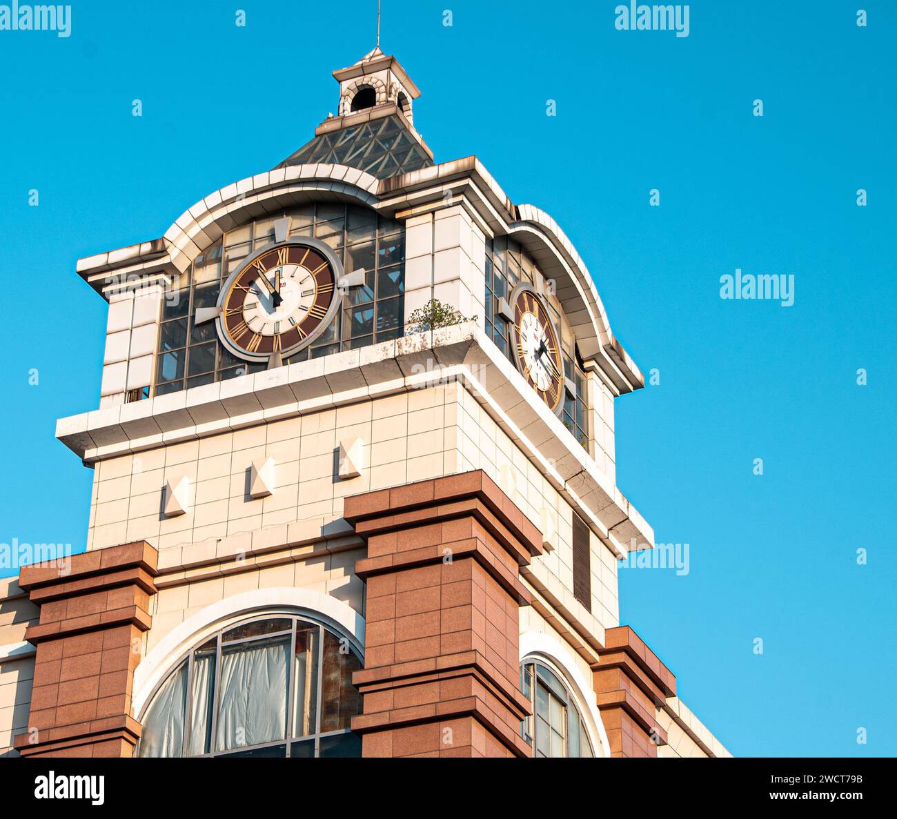 A large clock tower in a corner of a shopping mall in Wuhan Stock Photo ...