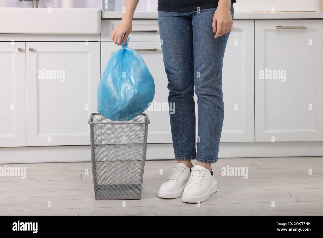 Taking out rubbish female hi-res stock photography and images - Alamy