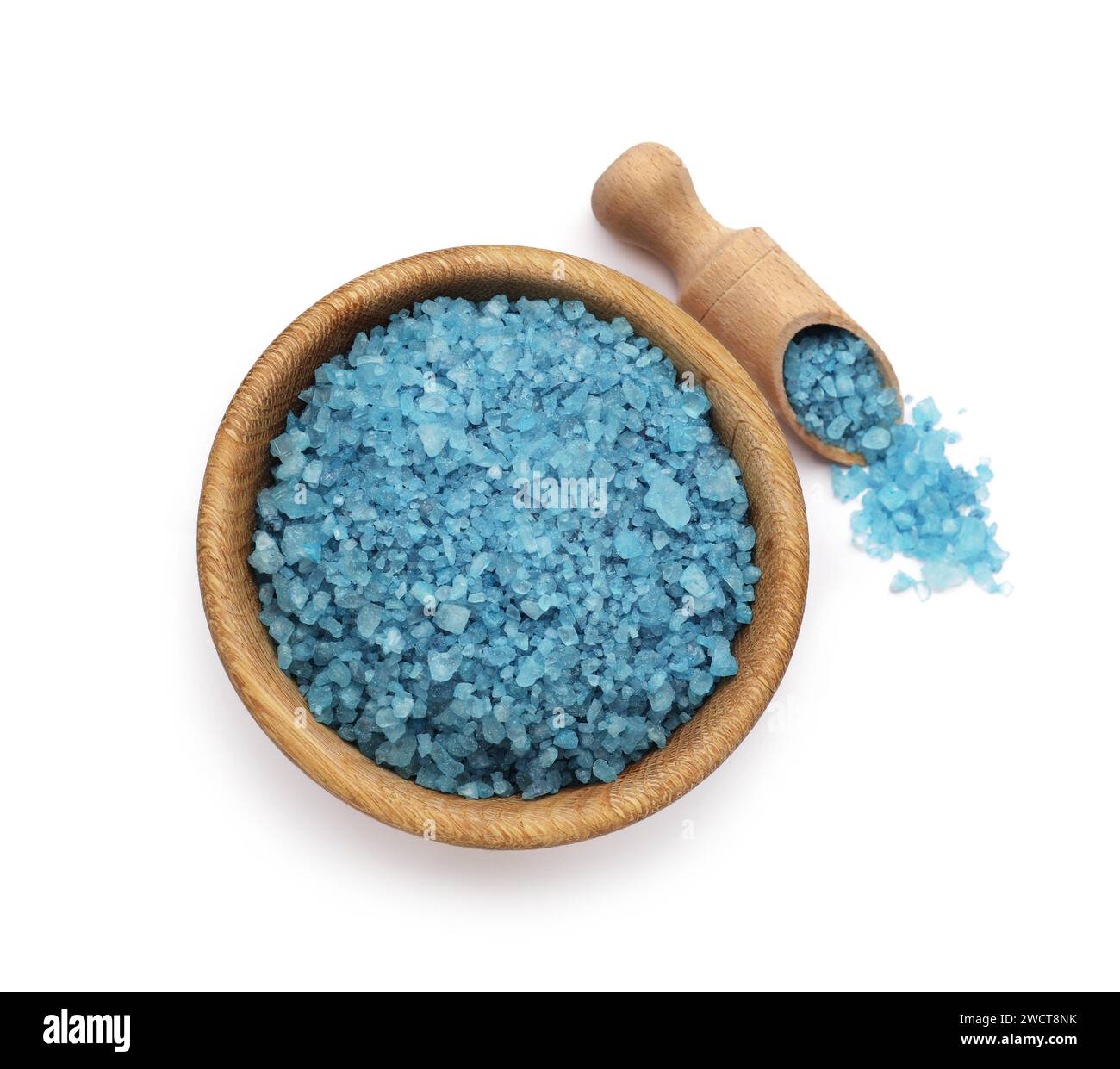 Bowl and scoop with blue sea salt isolated on white, top view Stock ...