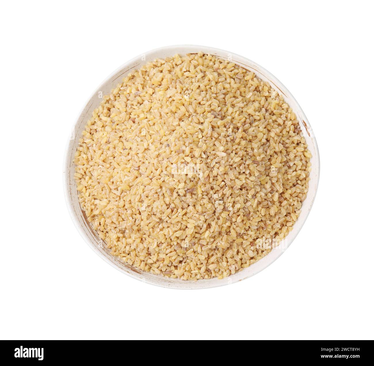 Raw bulgur in bowl isolated on white, top view Stock Photo - Alamy