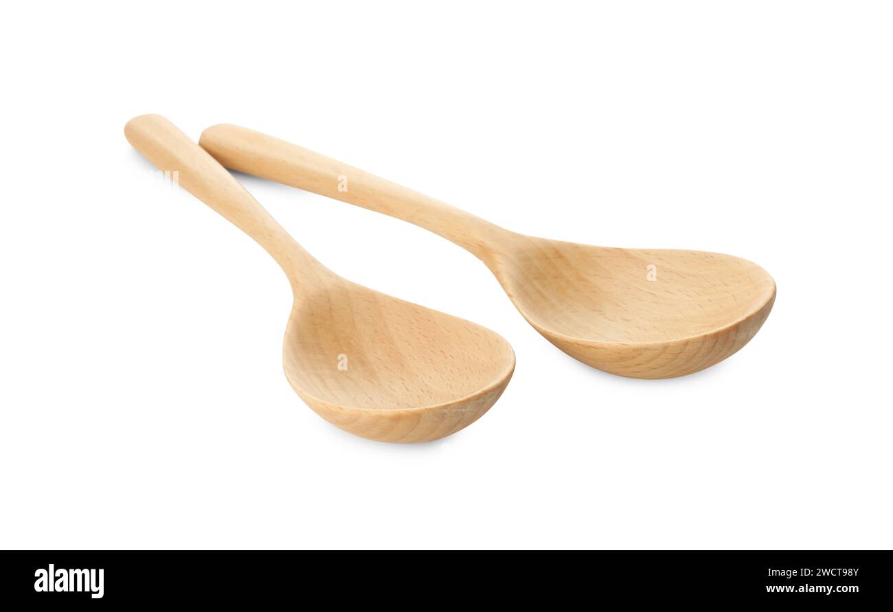 Two empty wooden spoons isolated on white Stock Photo - Alamy