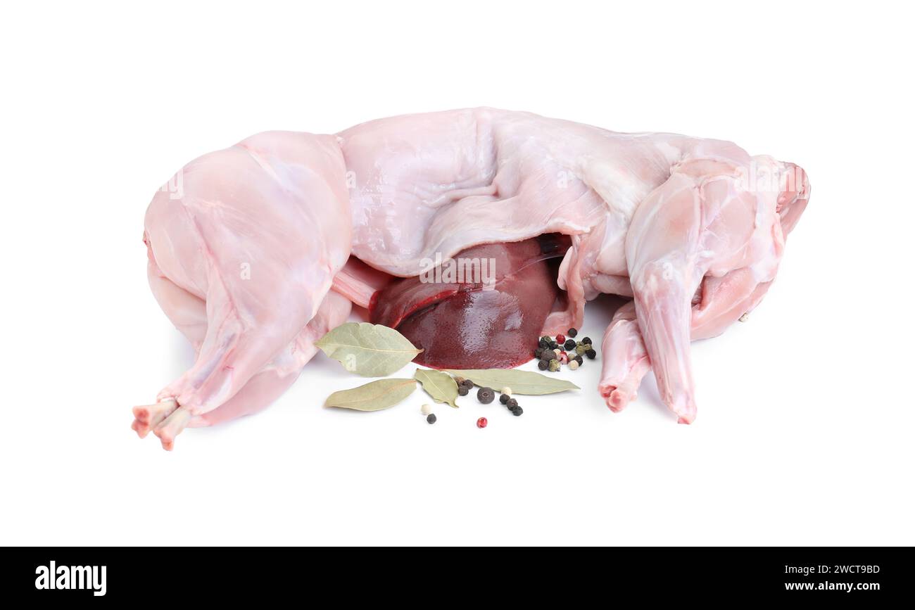 Whole raw rabbit, liver and spices isolated on white Stock Photo - Alamy