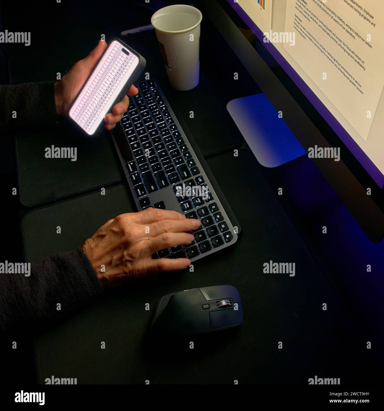 A professional simultaneously manages tasks on a smartphone and ...