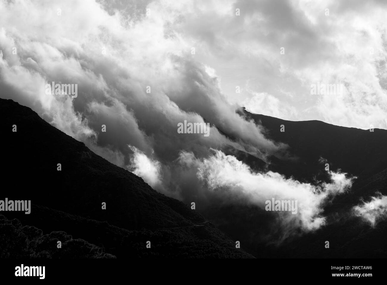 This black and white photo captures the intensity of swirling clouds ...