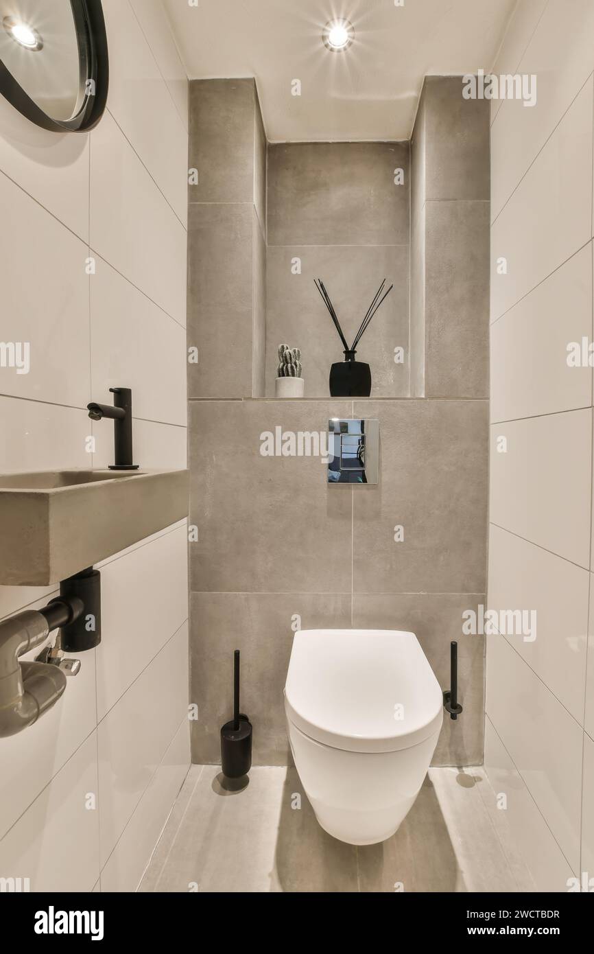 A contemporary minimalist bathroom featuring clean lines, neutral tones ...