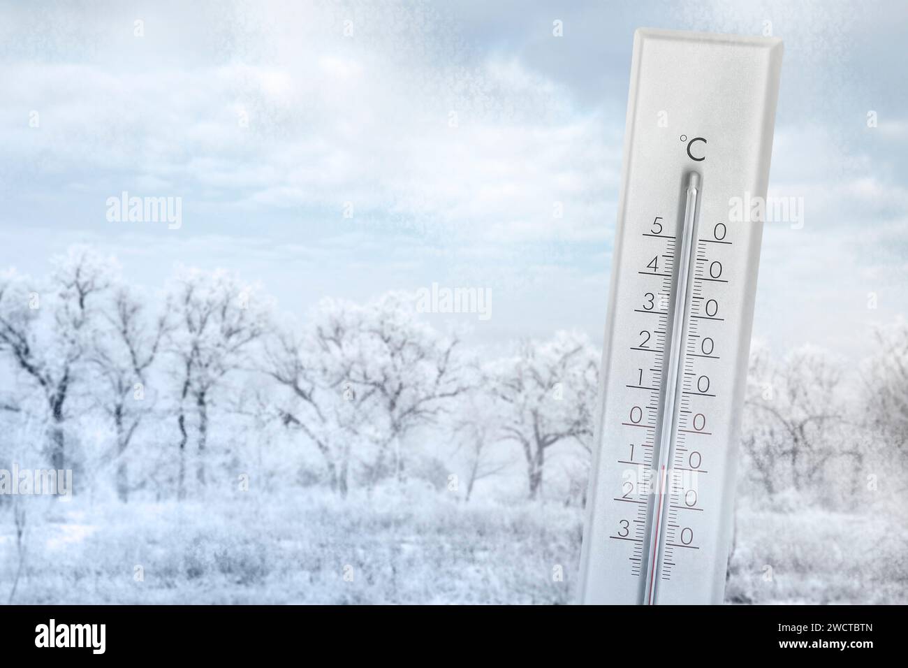 Thermometer showing temperature below zero outdoors on winter day Stock ...