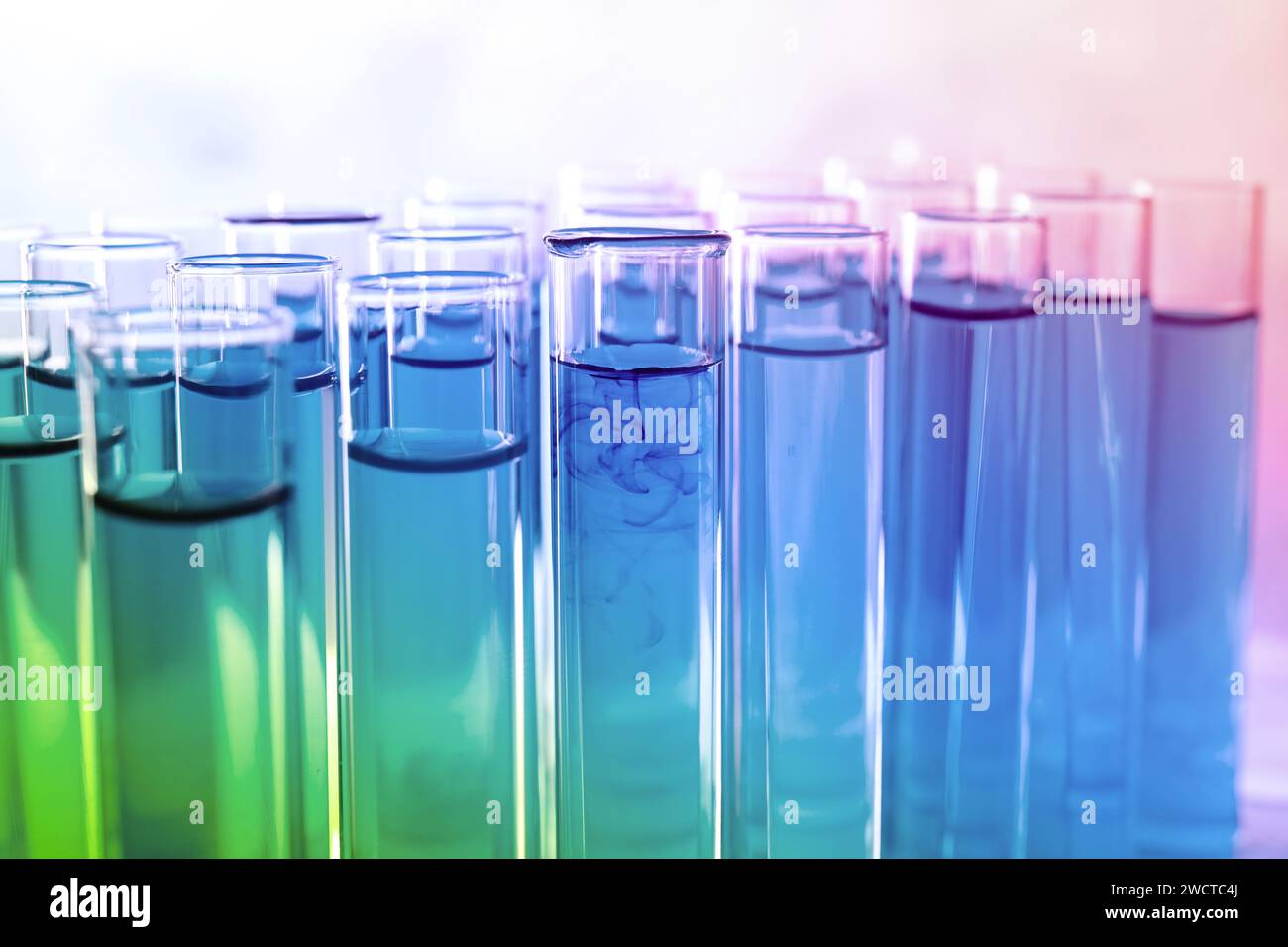 Test tubes with liquid, closeup. Color toned Stock Photo - Alamy