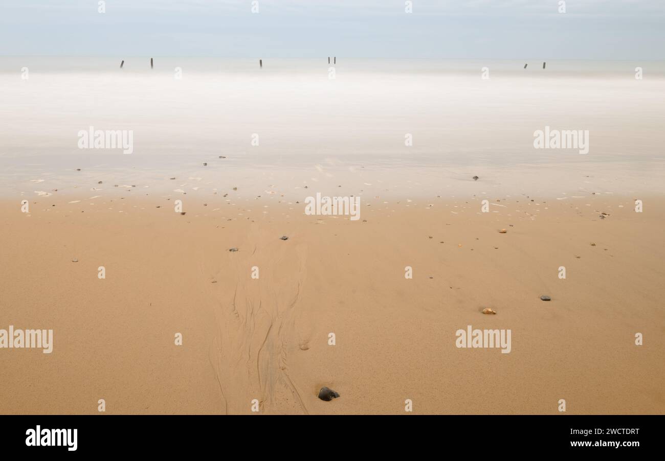 Long exposure soft pastel morning seascape of the old sea defences at ...