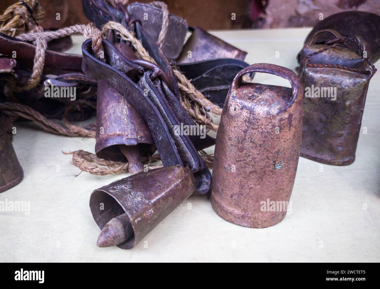 Traditional bells of different sizes made of copper for cattle ...