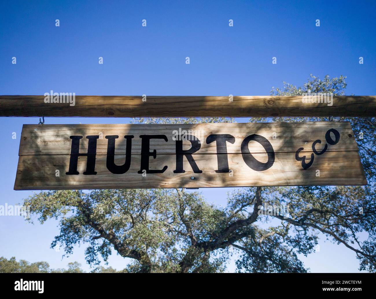 Organic kitchen garden hanging sign at mediterranean background ...