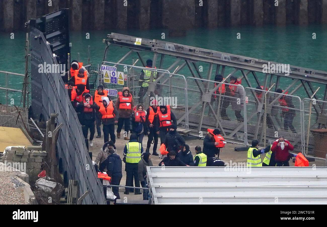 A group of people thought to be migrants are brought in to Dover, Kent ...