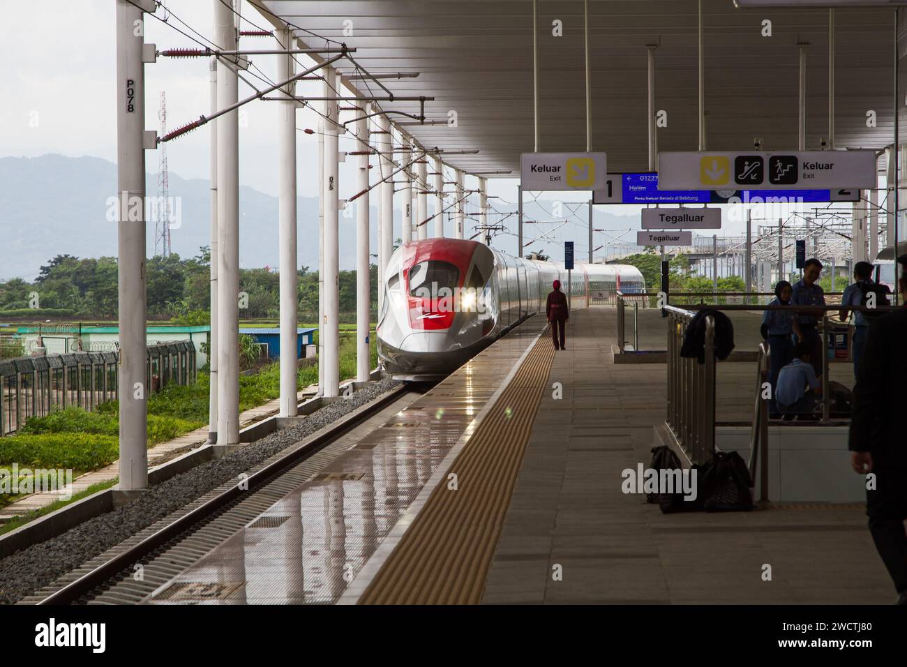 Electric Multiple Unit (EMU) train arrives at Tegalluar High Speed ...