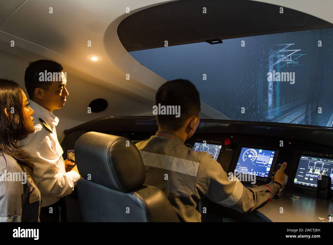 A China Indonesia High Speed Train (KCIC) machinist instructor gives ...