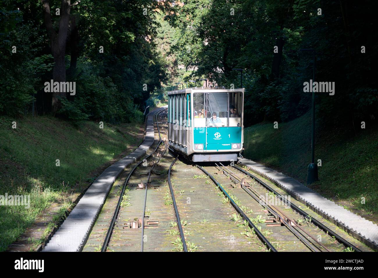 Photo taken in Prague, Czech Republic, capturing a cable car ascending ...