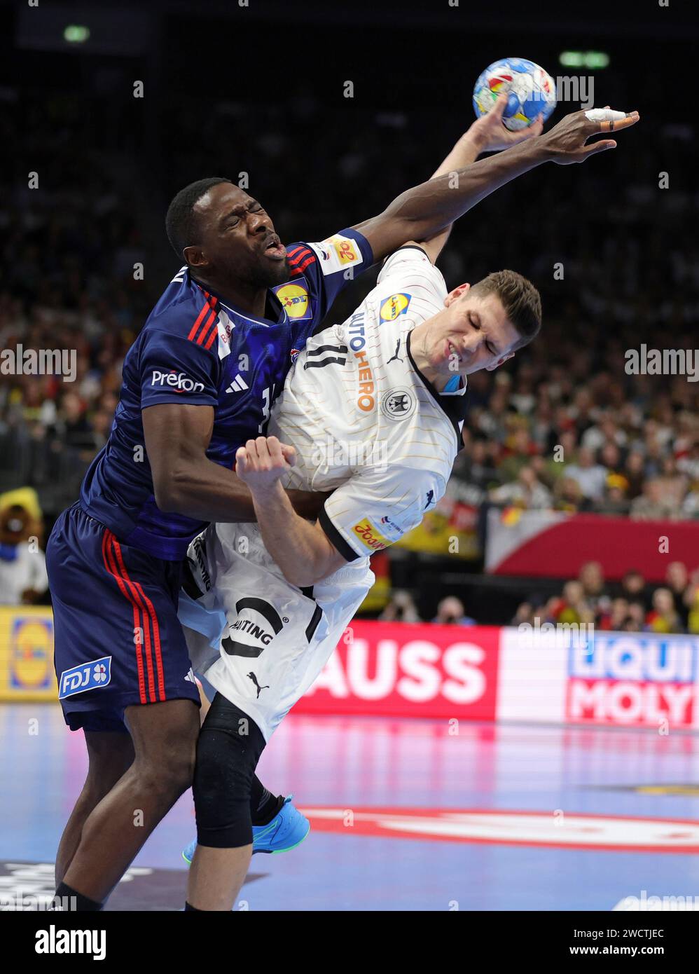 Sebastian Heymann #11 of Germany, Karl Konan #34 of France France vs ...
