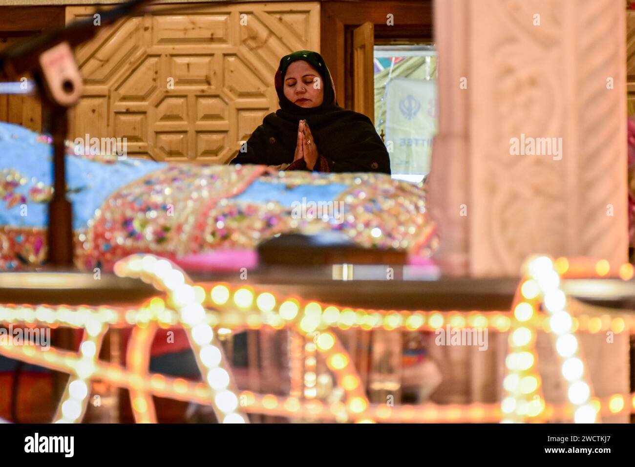 Srinagar, India. 17th Jan, 2024. A Sikh devotee prays on the occasion of the 357th birth ...