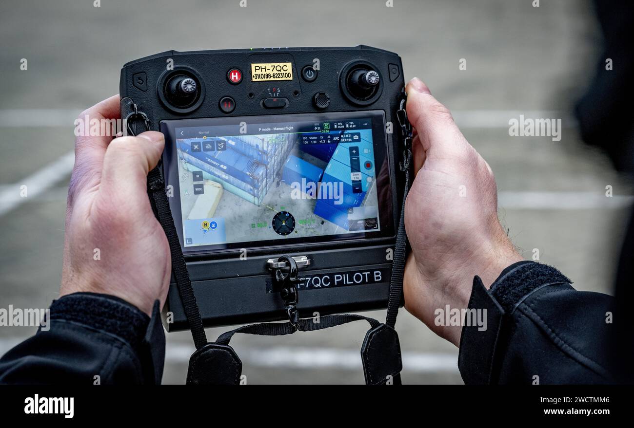 ROTTERDAM - A special team with a drone during a demonstration of ...