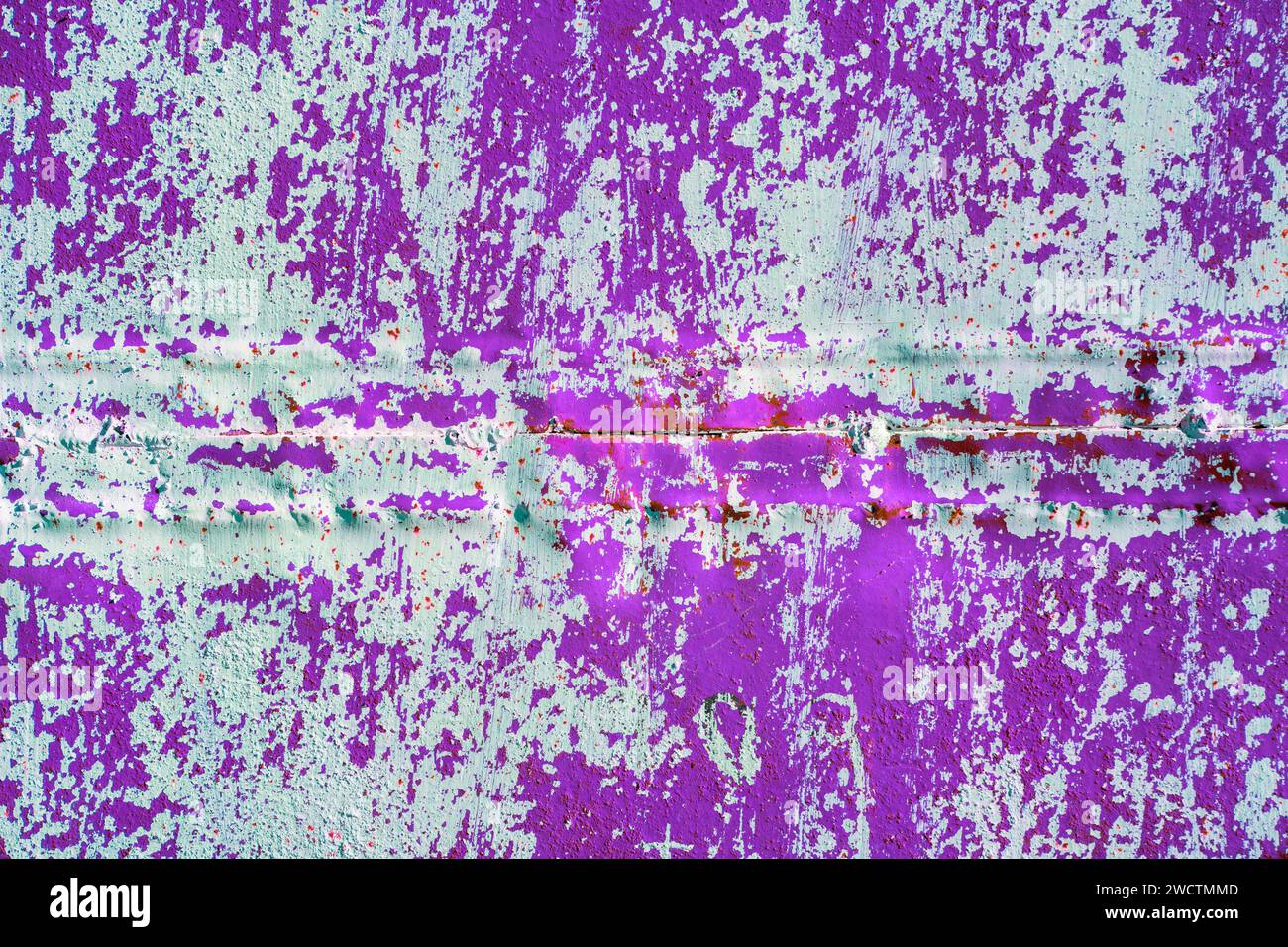 purple steel sheet wall with peeled off white paint under direct ...