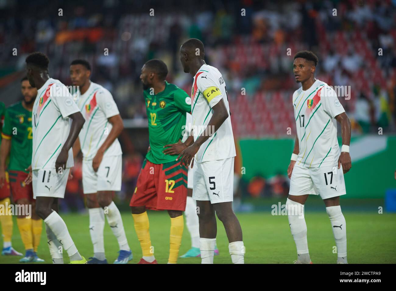 Cameroonian and Guinean players in the penalty area for a corner Stock ...