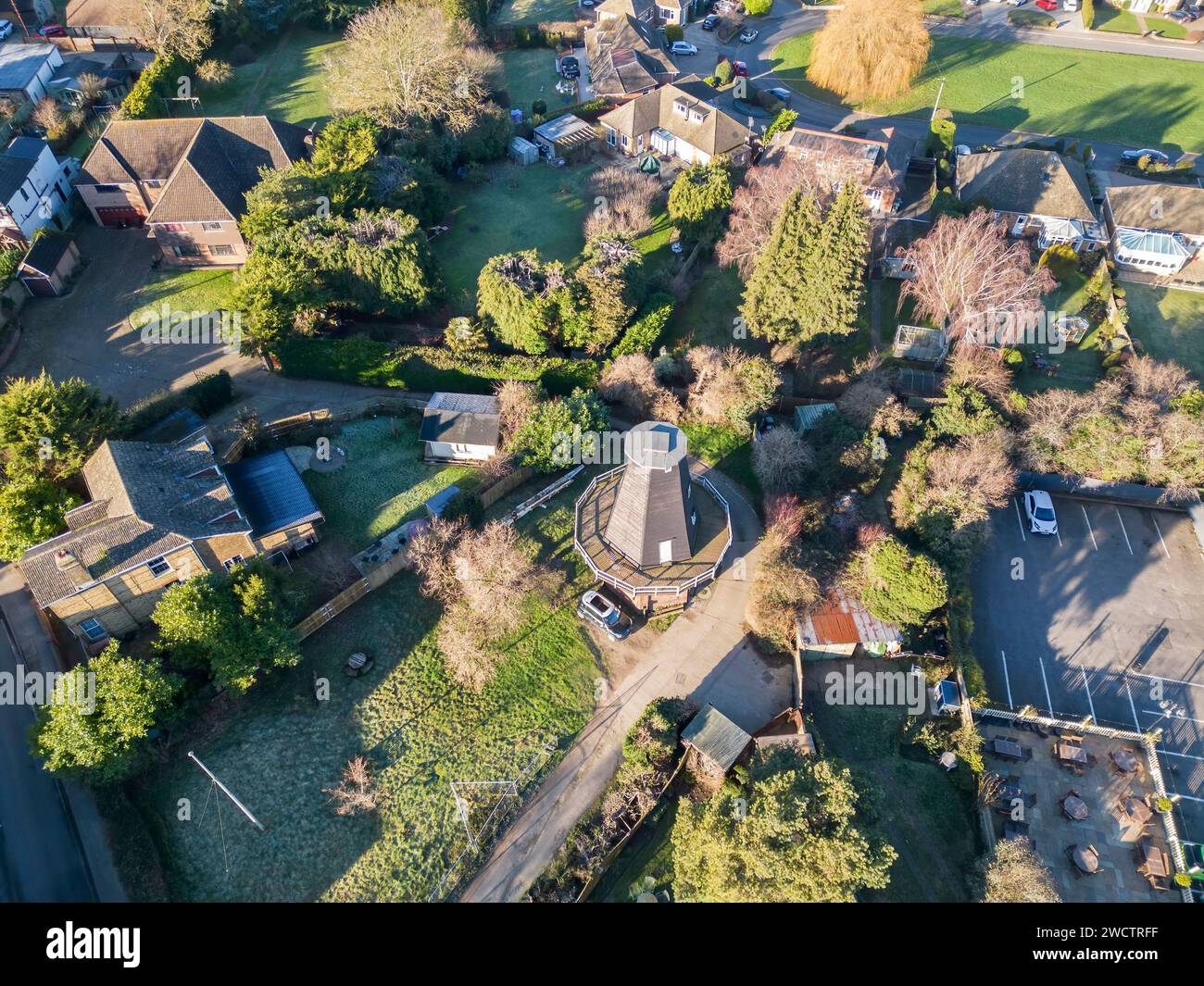 aerial view of the part restored rare grade 2 listed 6 sided smock mill ...