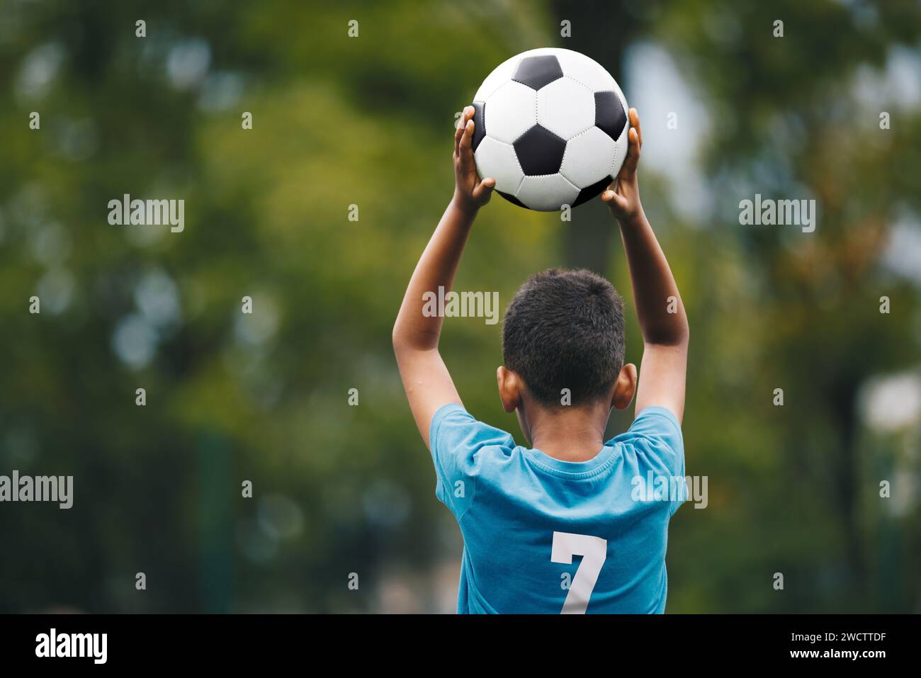Soccer Throw In During Children Sports Game. Little Boy Holding Soccer ...