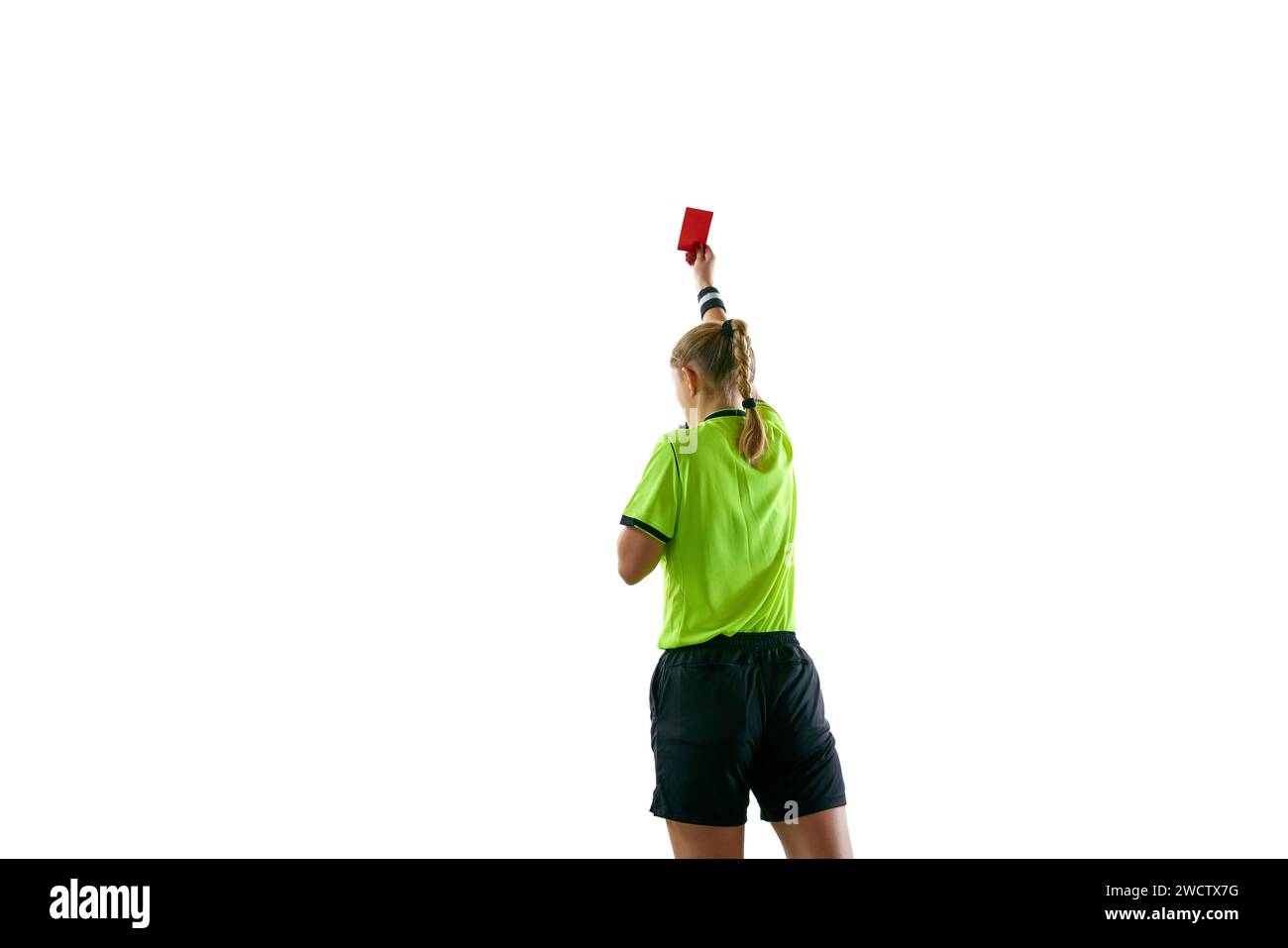 Serious woman, soccer referee gesturing, raising hand, stopping game ...