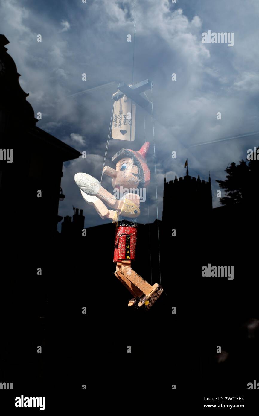 Vintage wooden pinocchio string puppet hi-res stock photography and ...