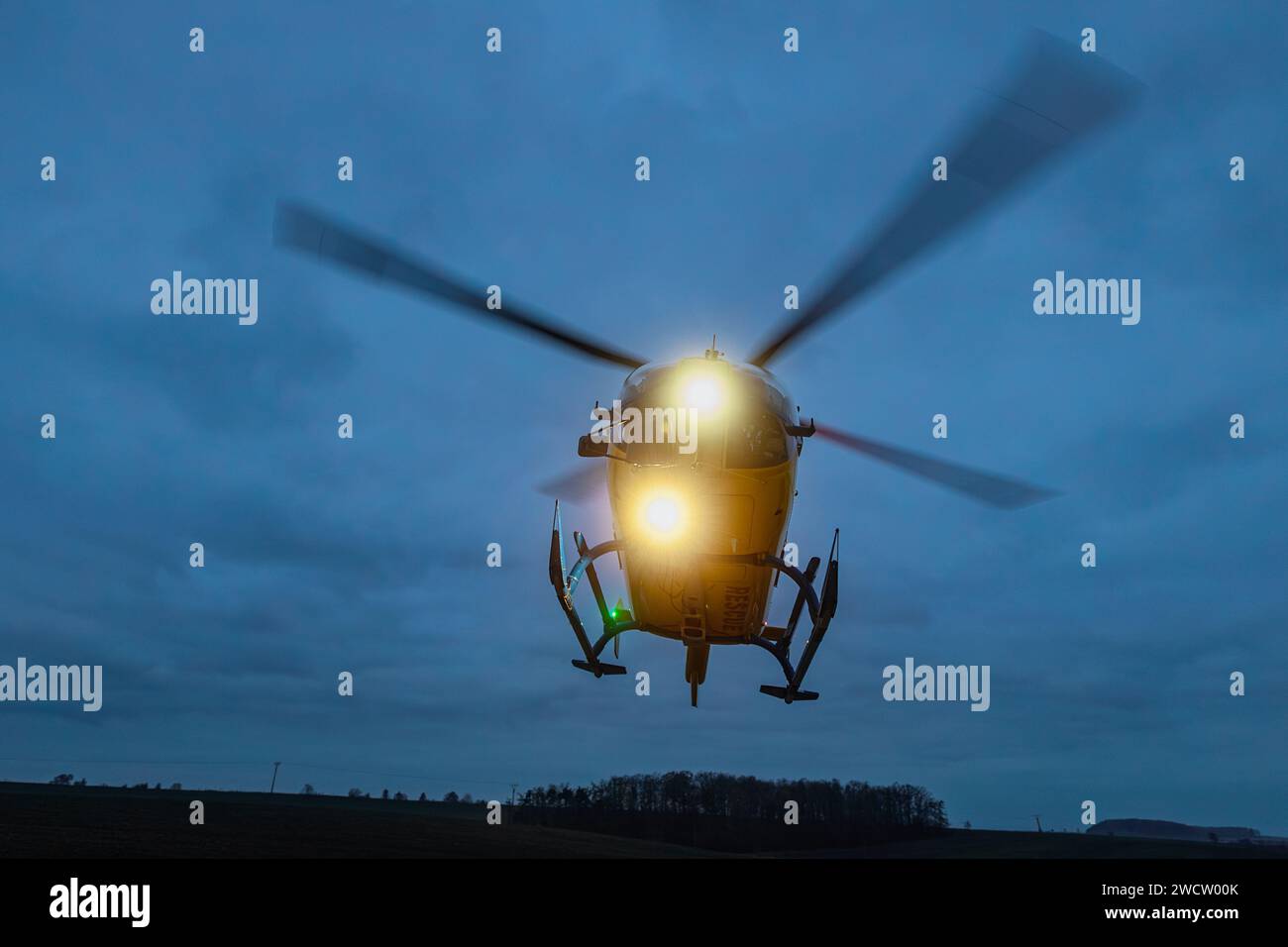 Helicopter of emergency medical service during take off at night ...