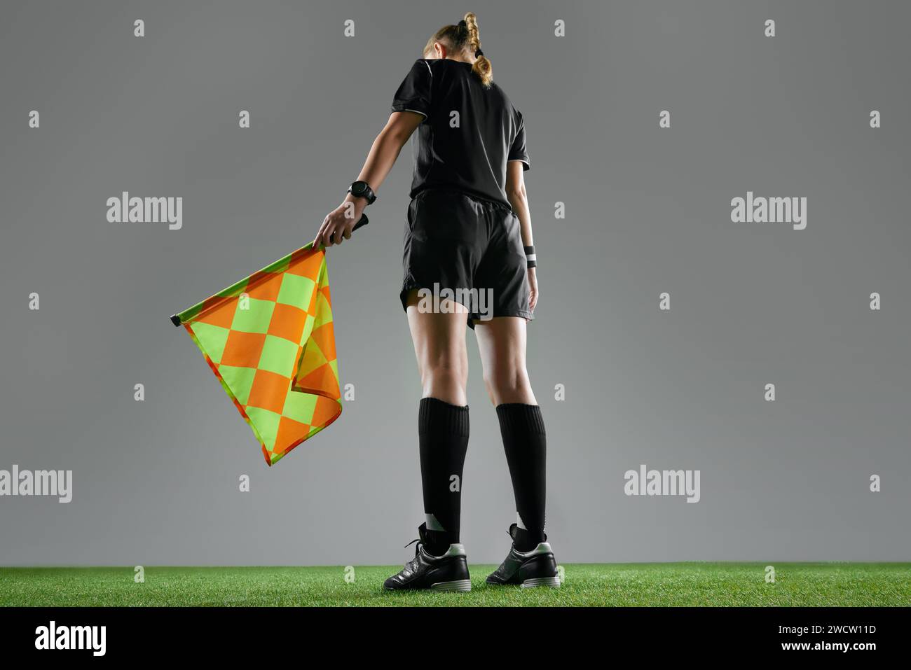 Back view football referee controlling hi-res stock photography and ...