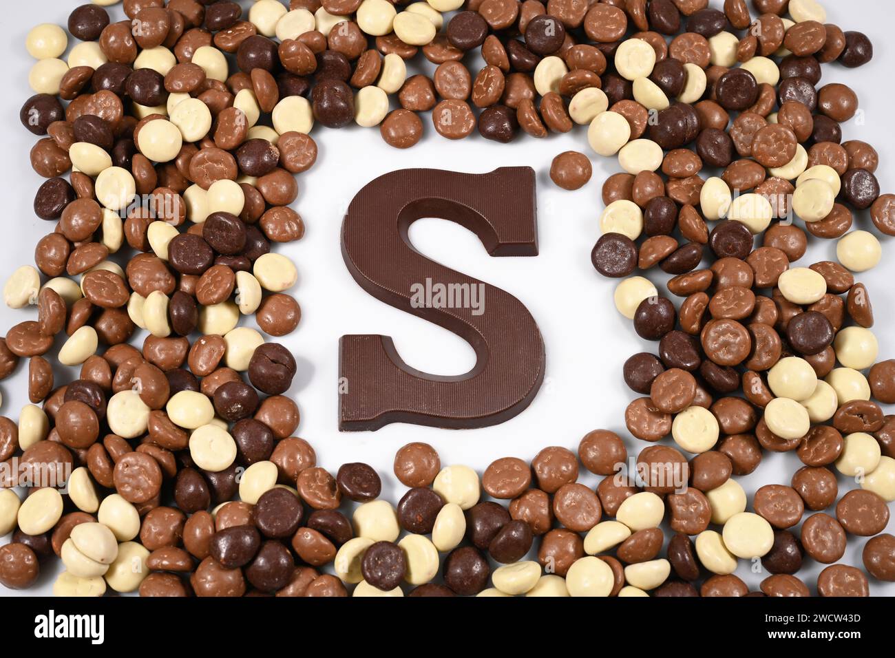 Chocolate character and small cookies Stock Photo - Alamy