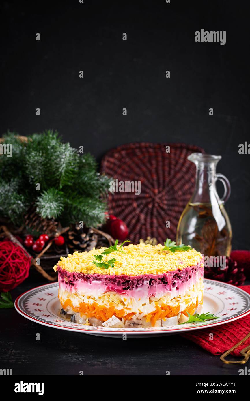 Traditional Russian multi layered salad from herring, beets, potatoes ...