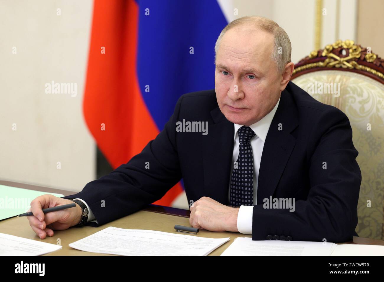 Russian President Vladimir Putin leads a cabinet meeting via ...