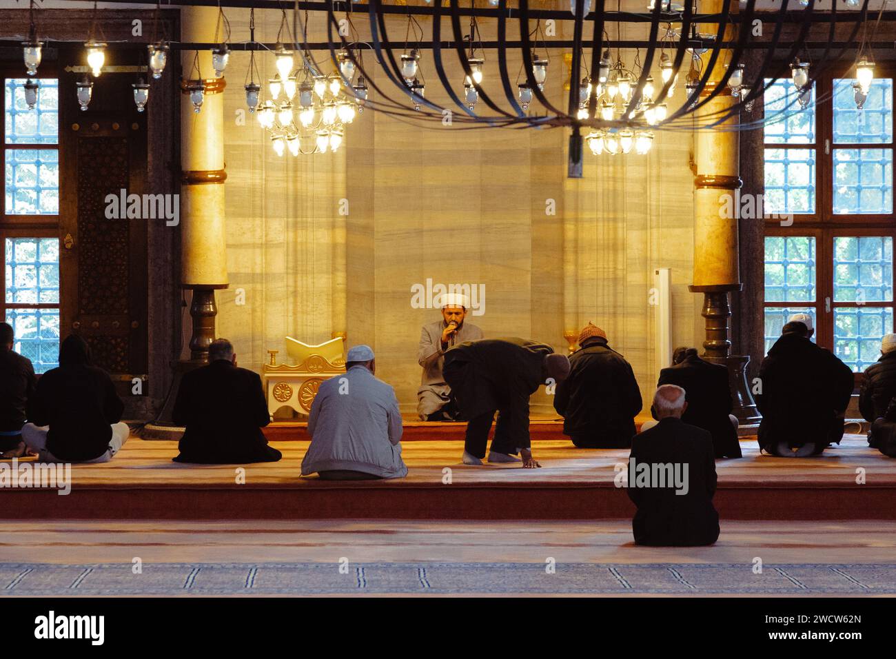 Men and imam praying in The Şehzade Mosque (16th-century Ottoman Empire ...