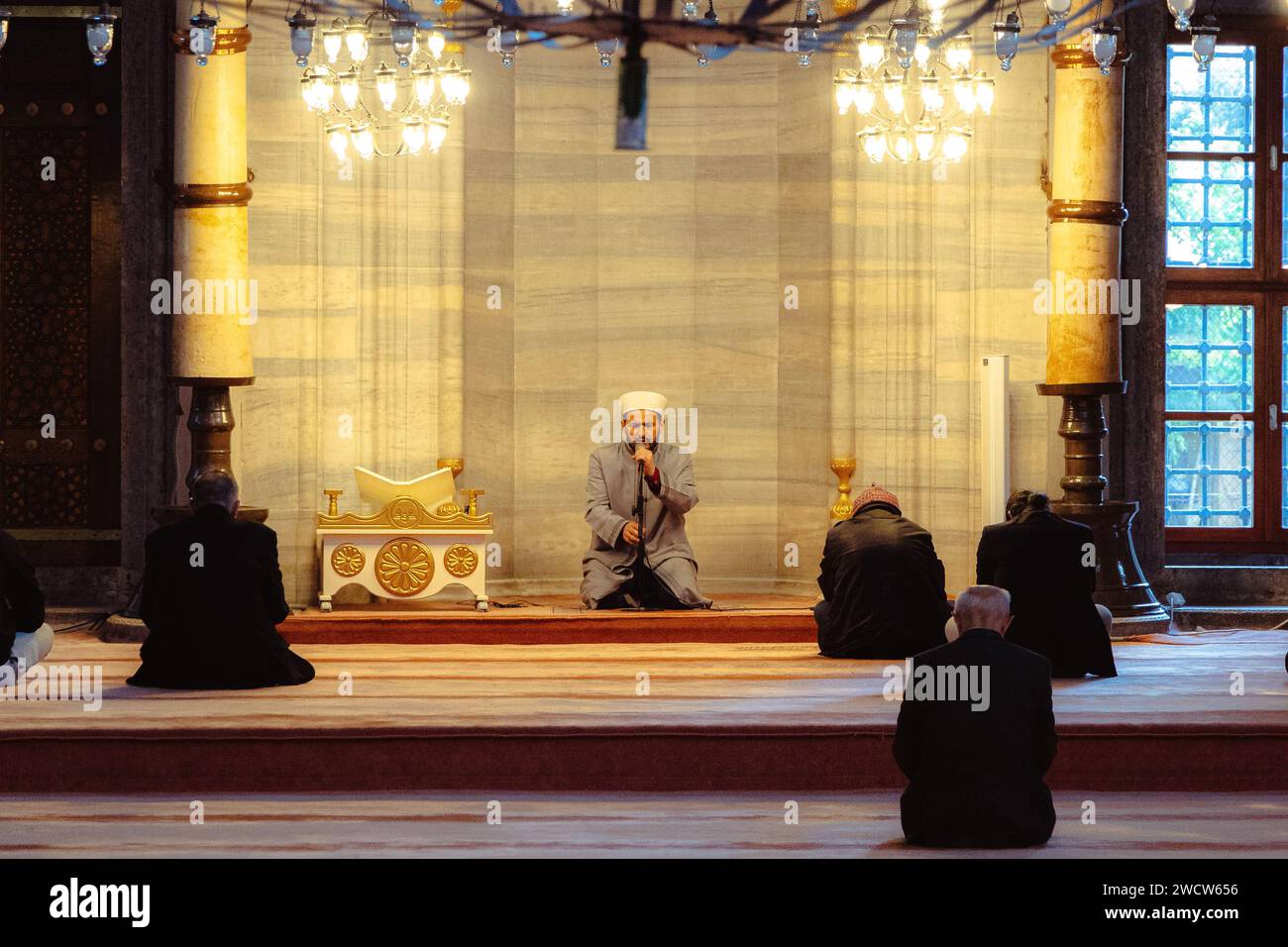 Men and imam praying in The Şehzade Mosque (16th-century Ottoman Empire ...