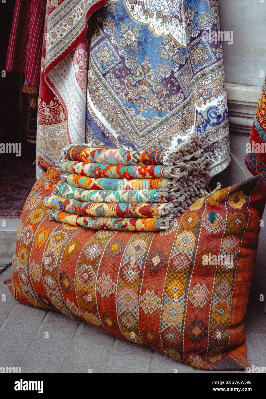 A vibrant Turkish oversized cushion adorned with Turkish kilims ...
