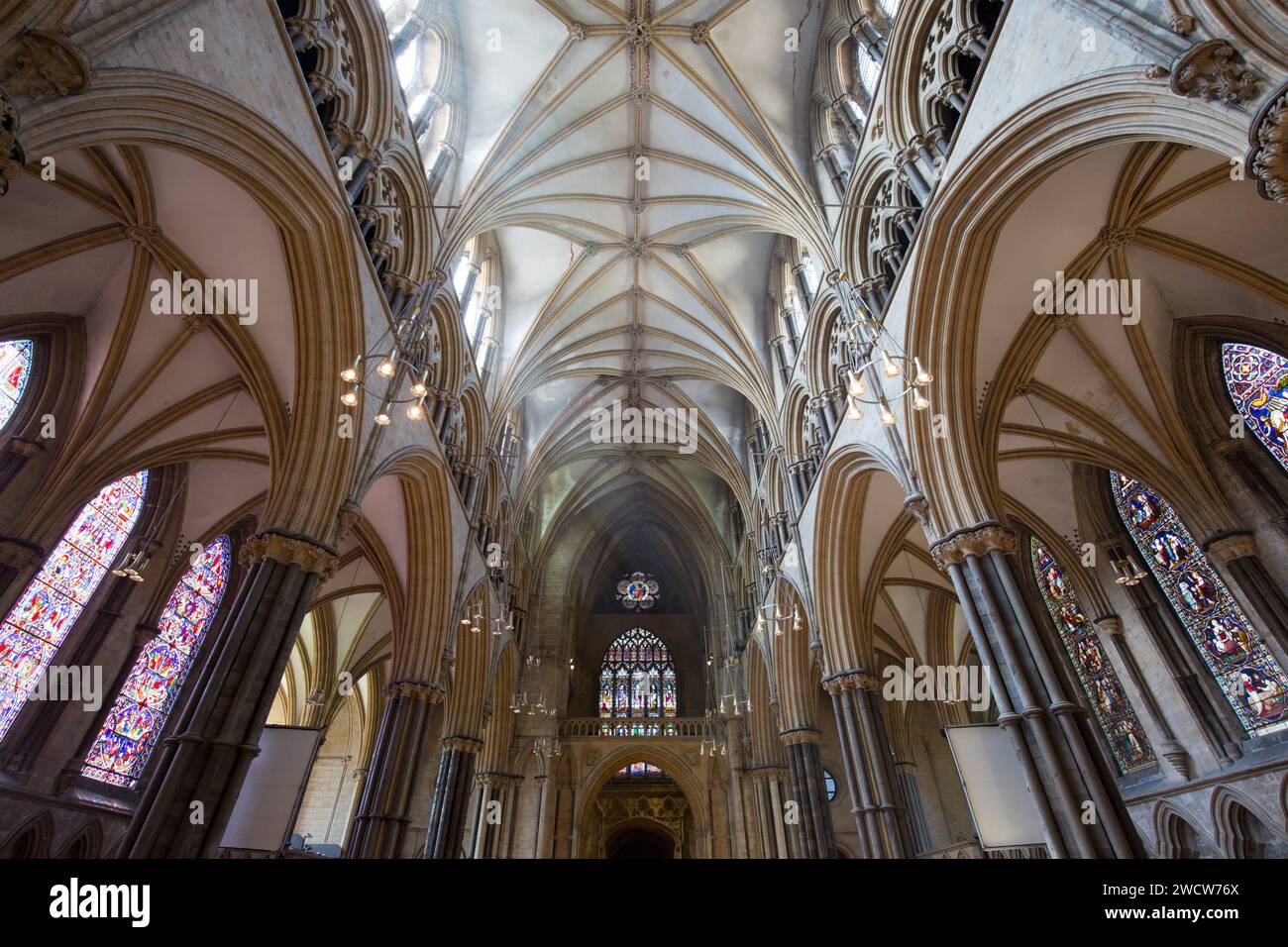 Lincoln, Lincolnshire, England. Low angle view along the nave of ...